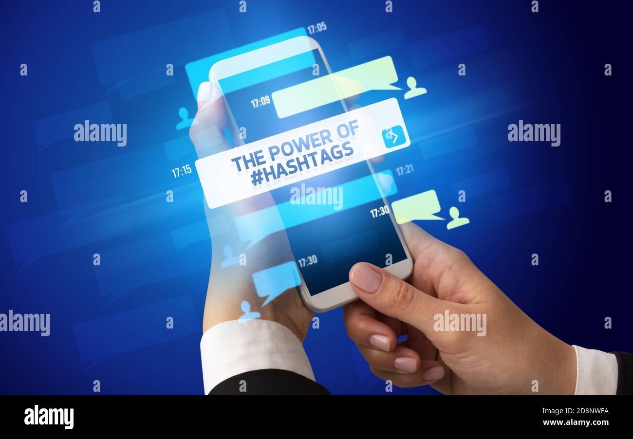 Female hand typing on smartphone with THE POWER OF #HASHTAGS ...