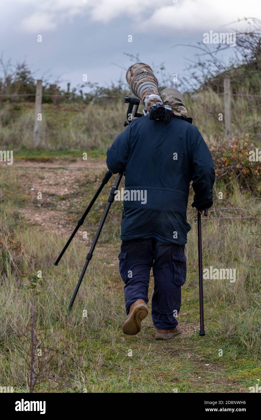 birdwatcher twitcher birder wildlife enthusiast using a walking stick ...