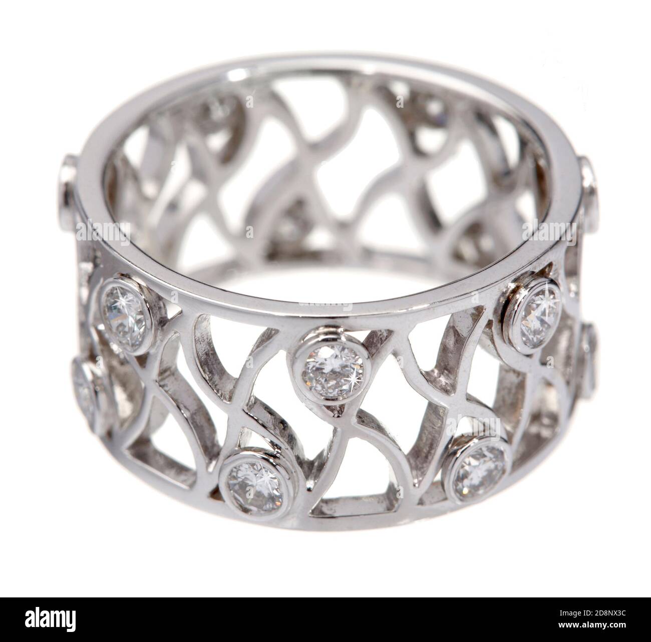 silver ring with precious stones photographed on a white background ...