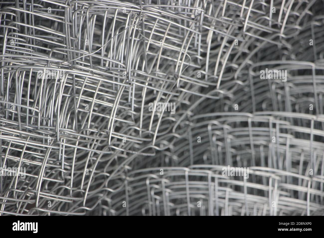 Metal mesh rabitz netting rolled into rolls and coils of steel wire ...