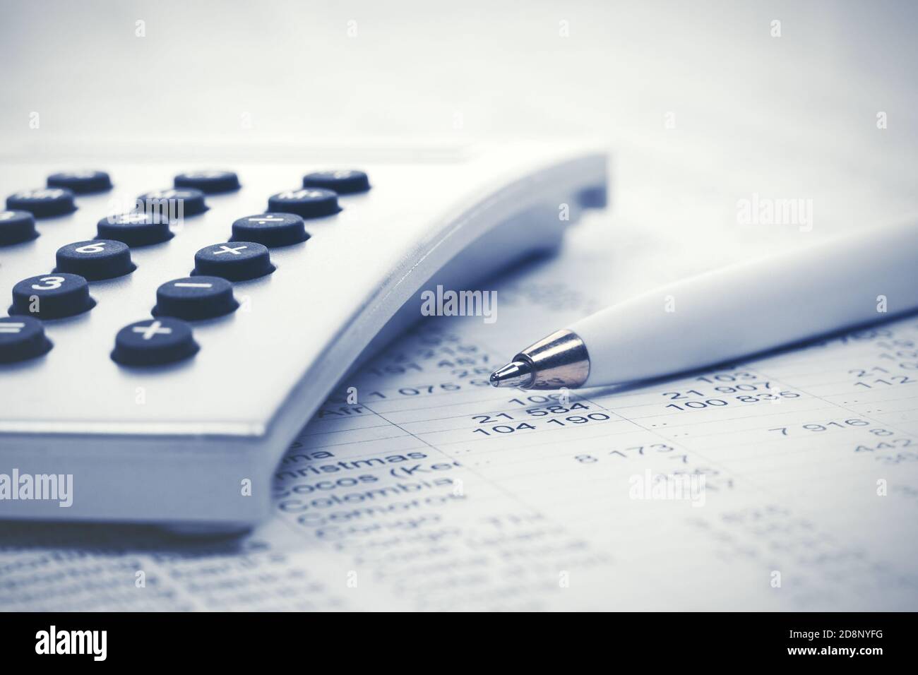 Financial accounting Pen and calculator on balance sheets Stock Photo ...