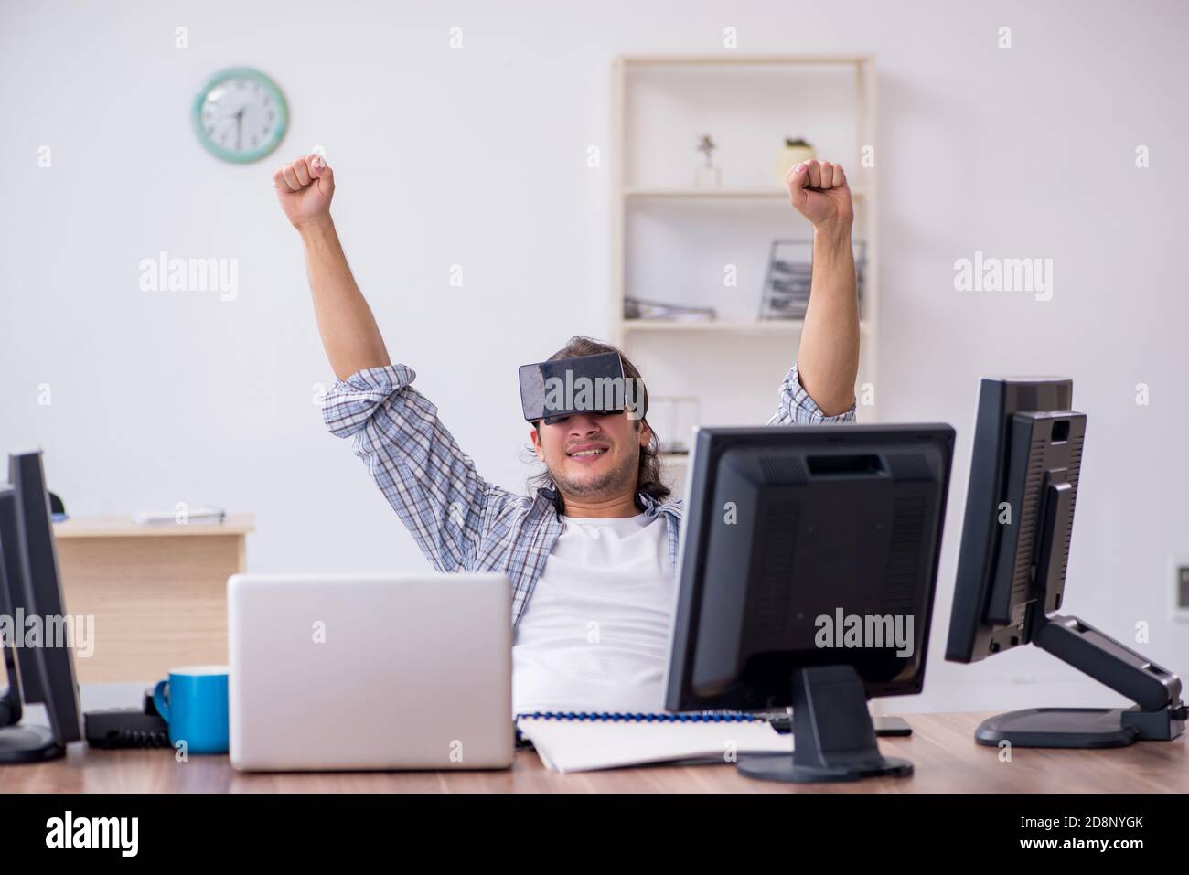 Male it specialist working in the office Stock Photo - Alamy