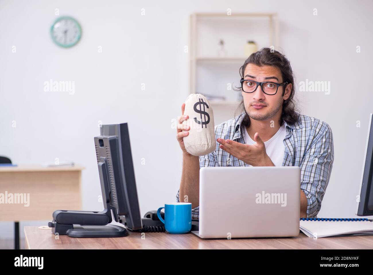 Male it specialist working in the office Stock Photo - Alamy