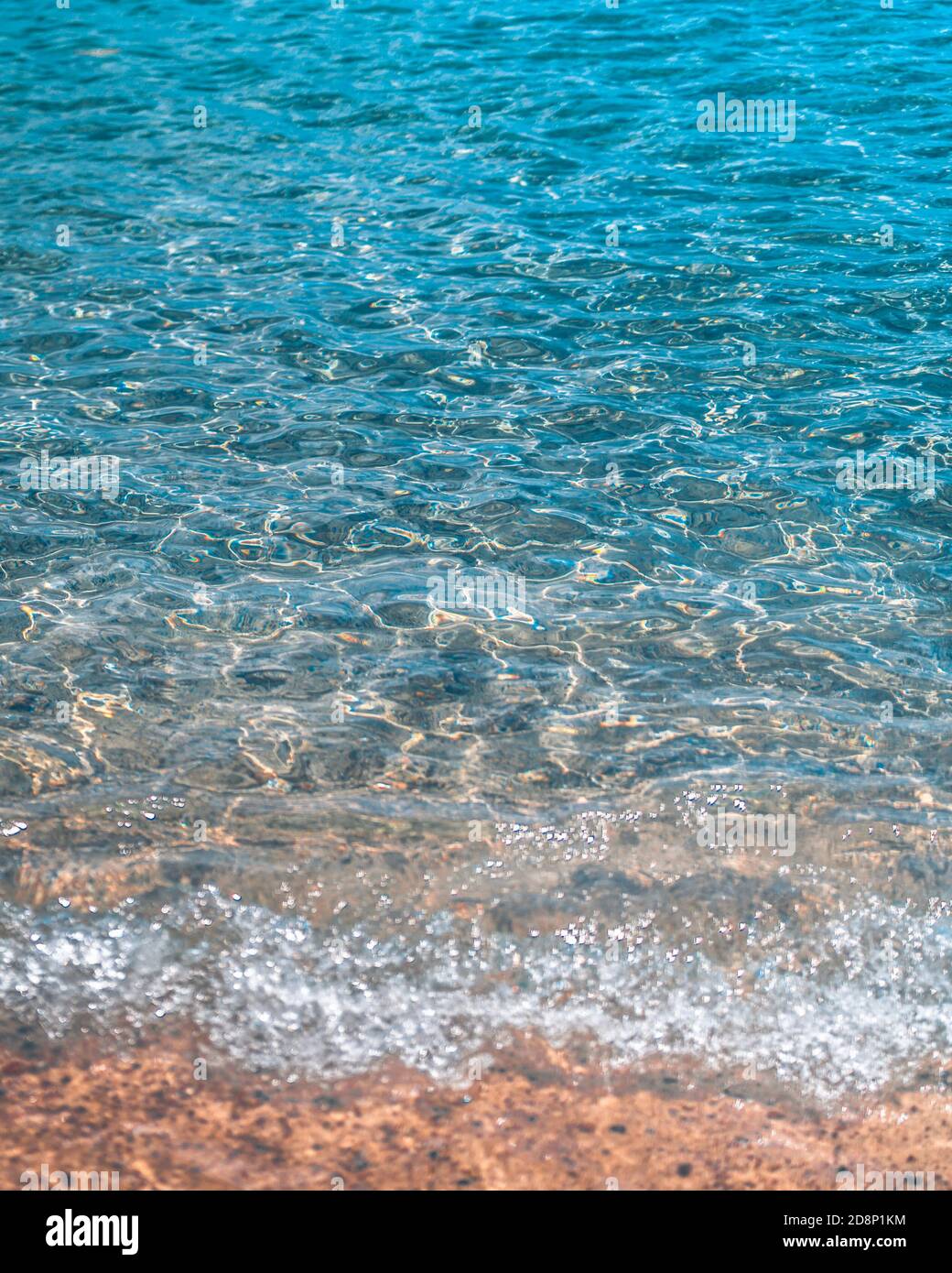 Turquoise Caribbean waves washing ashore the beach in St. Lucia Stock ...