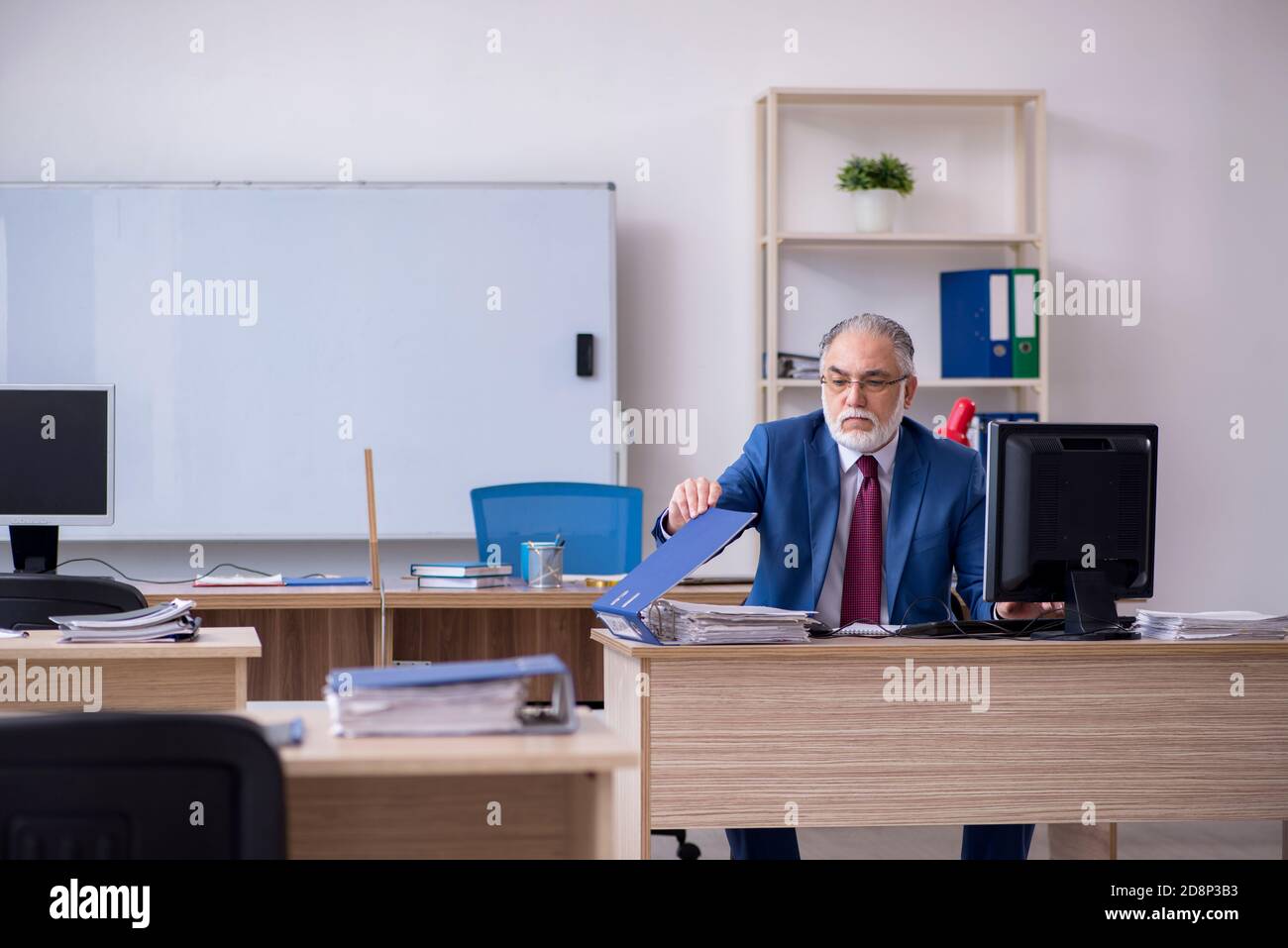 Male boss employee working in the office Stock Photo - Alamy