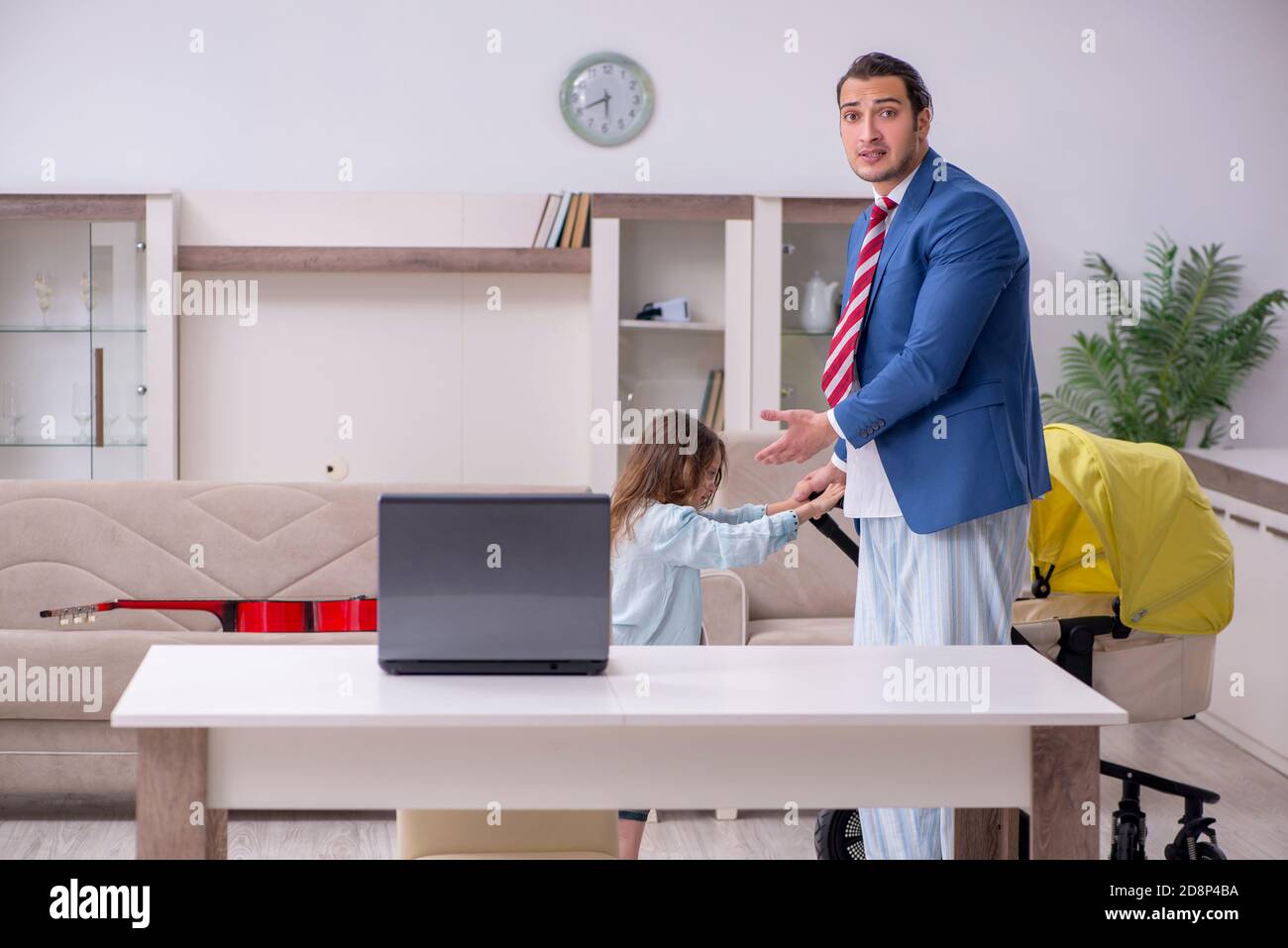 Working father suit and children hi-res stock photography and images ...