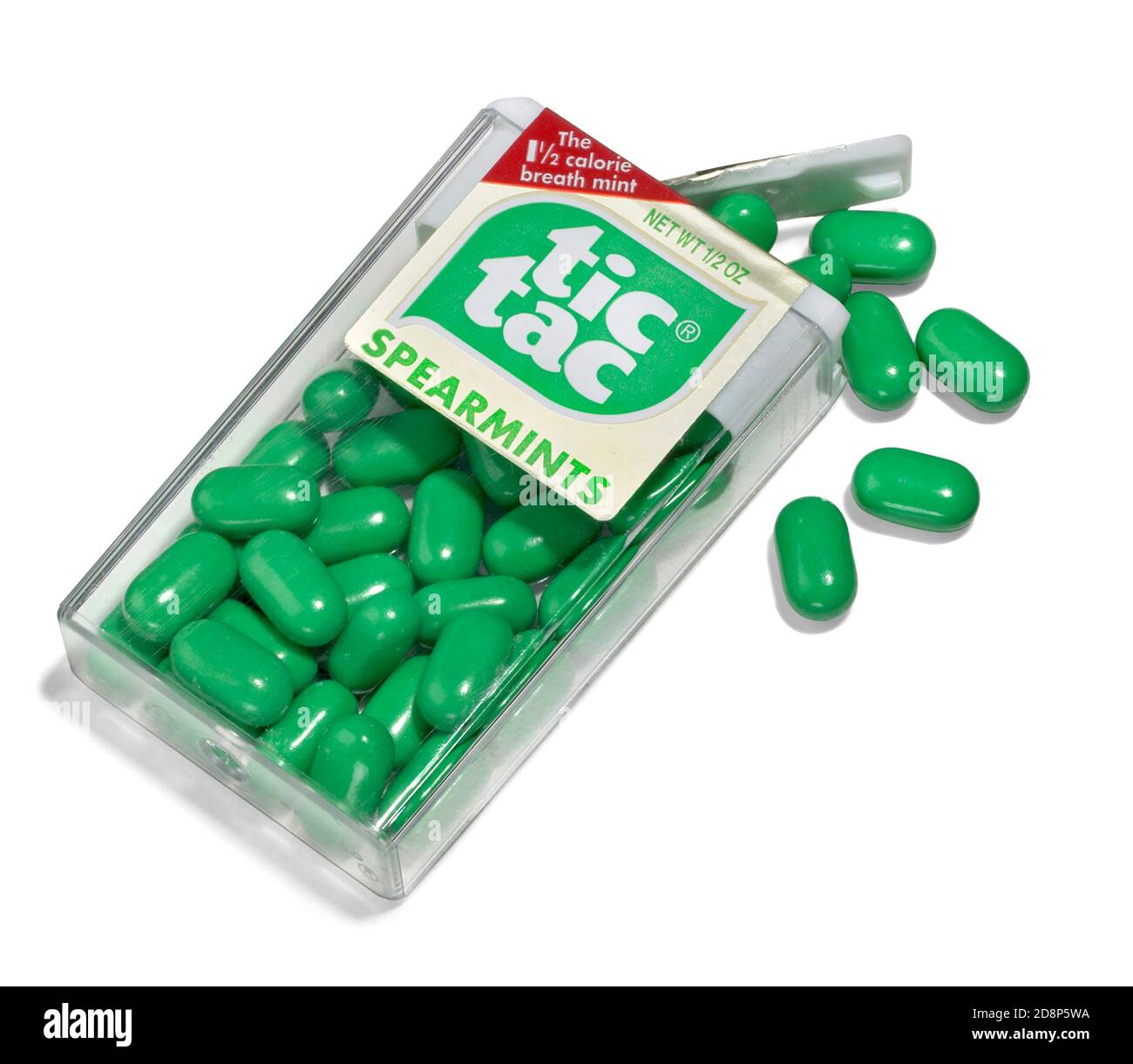 Open pack of spearmint tic tacs photographed on a white background ...