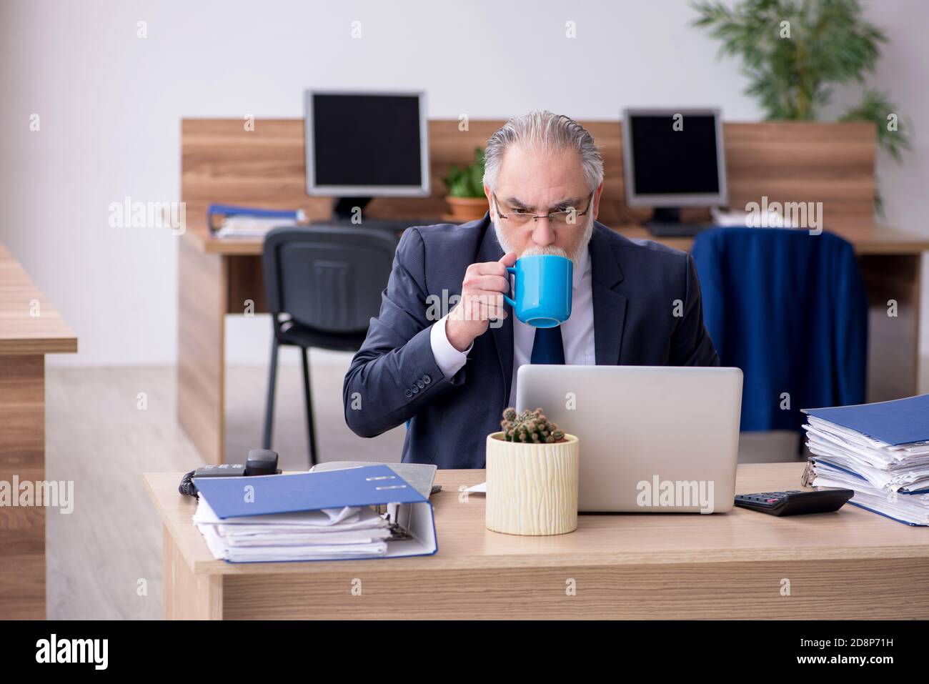 Hardworking senior old man having hi-res stock photography and images ...