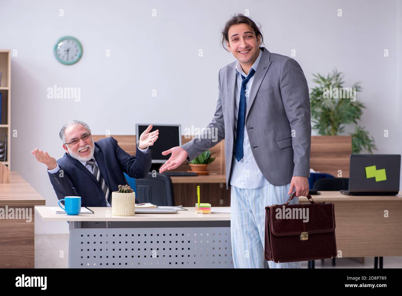 Young employee being late for work Stock Photo - Alamy