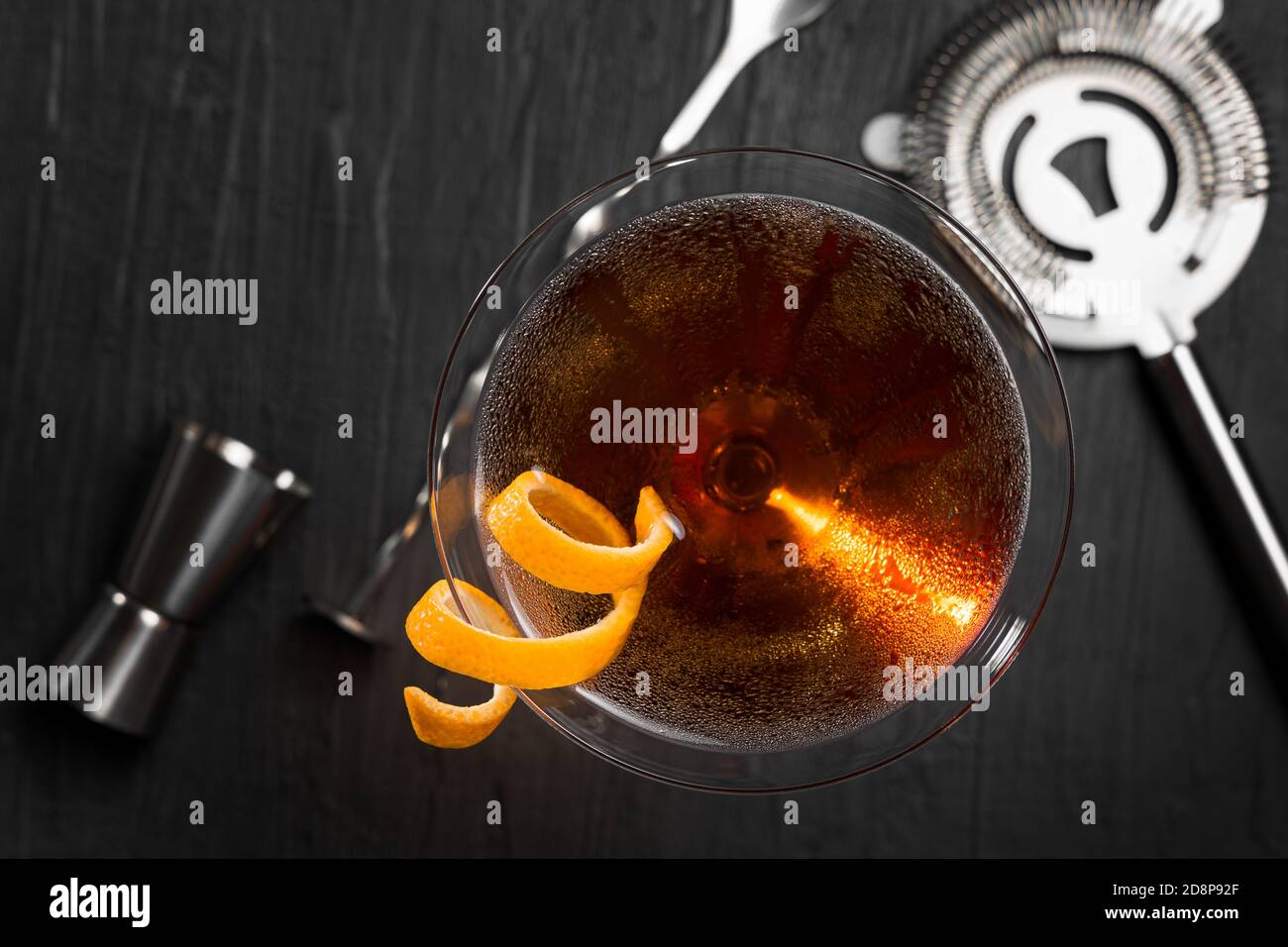 Manhattan cocktail with an orange twist as a garnish. Top view Stock ...