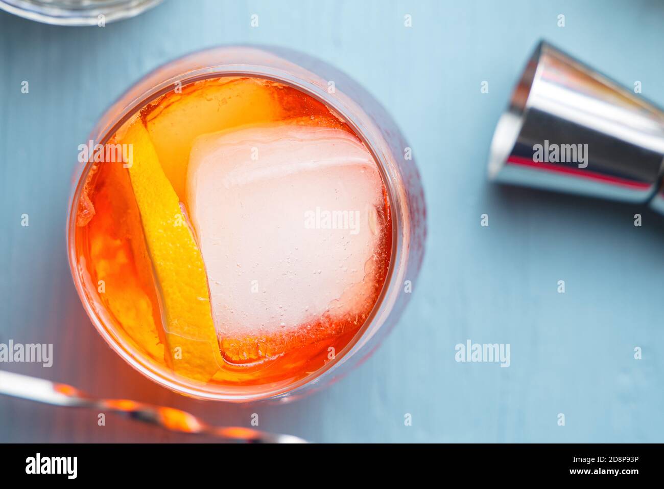 Glass of classic italian aperitif spritz cocktail with slice of orange ...