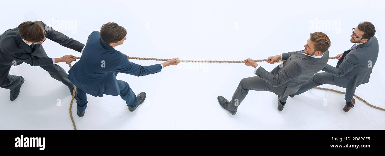 top view.a tug of war between business teams Stock Photo - Alamy