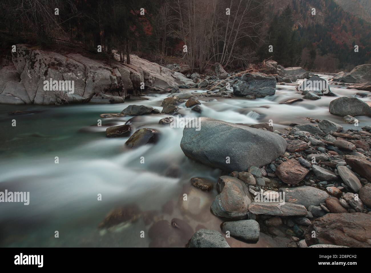 Long exposition shot of a river with silk effect on the water, while ...