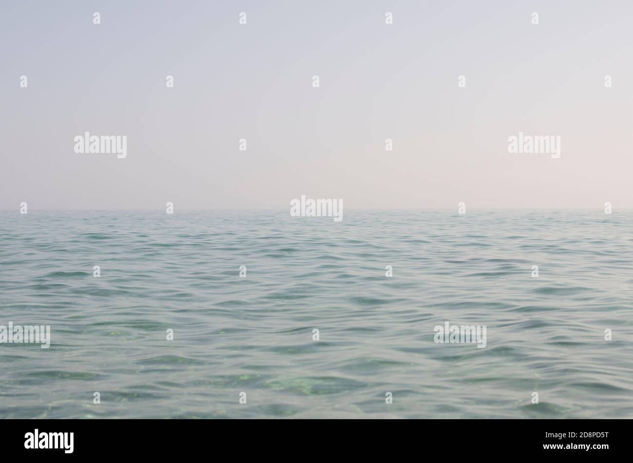 an endless clear blue calm sea to the horizon Stock Photo - Alamy