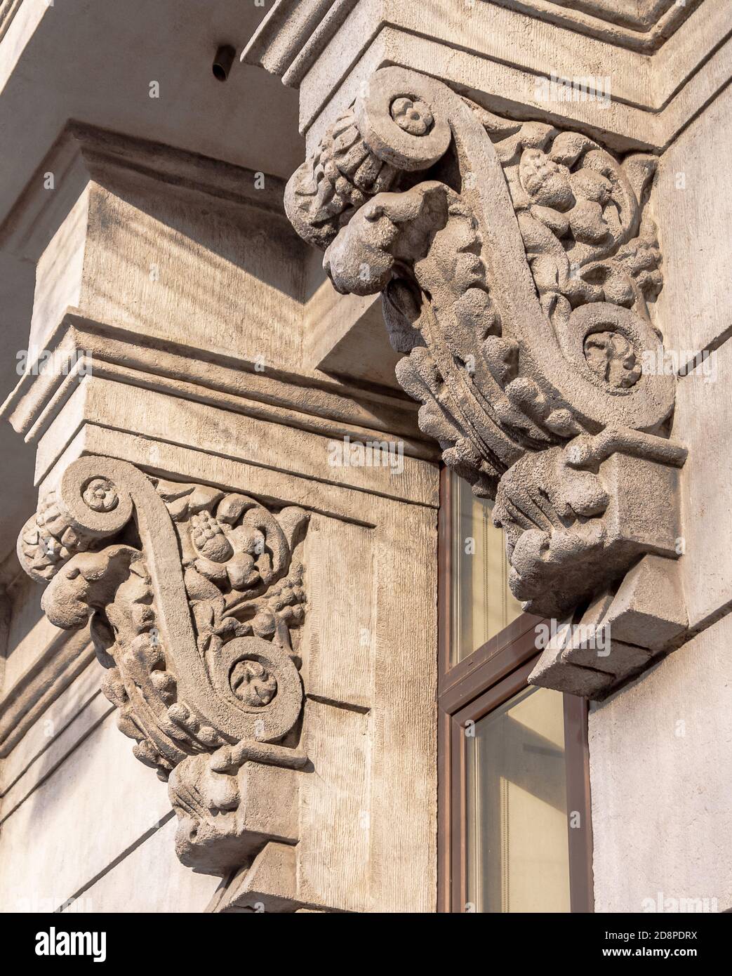 decorative elements on the Windows of the building facade Stock Photo ...