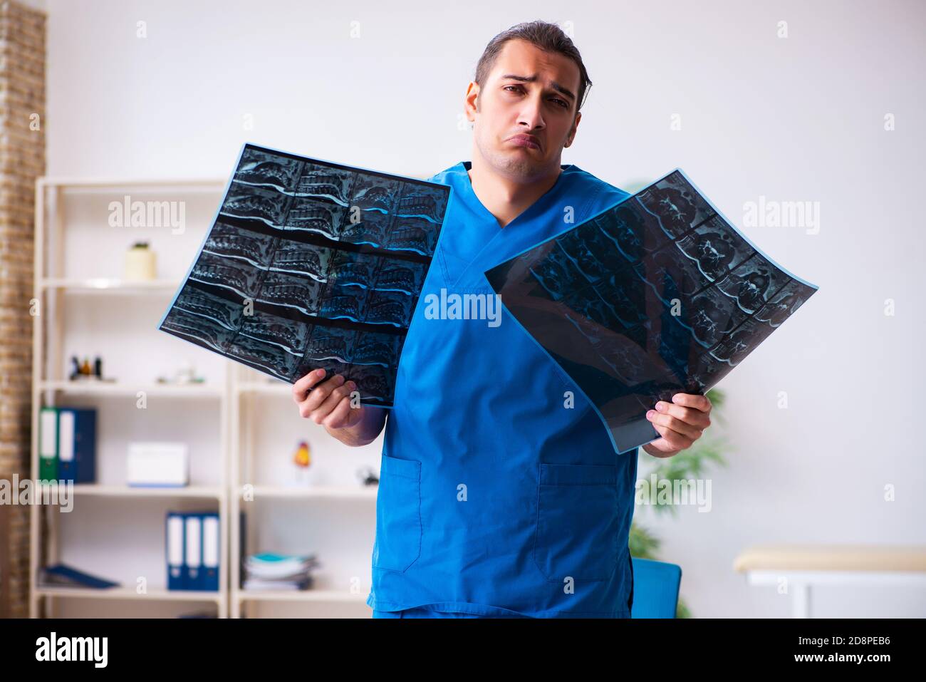 Young doctor radiologist working in the clinic Stock Photo - Alamy