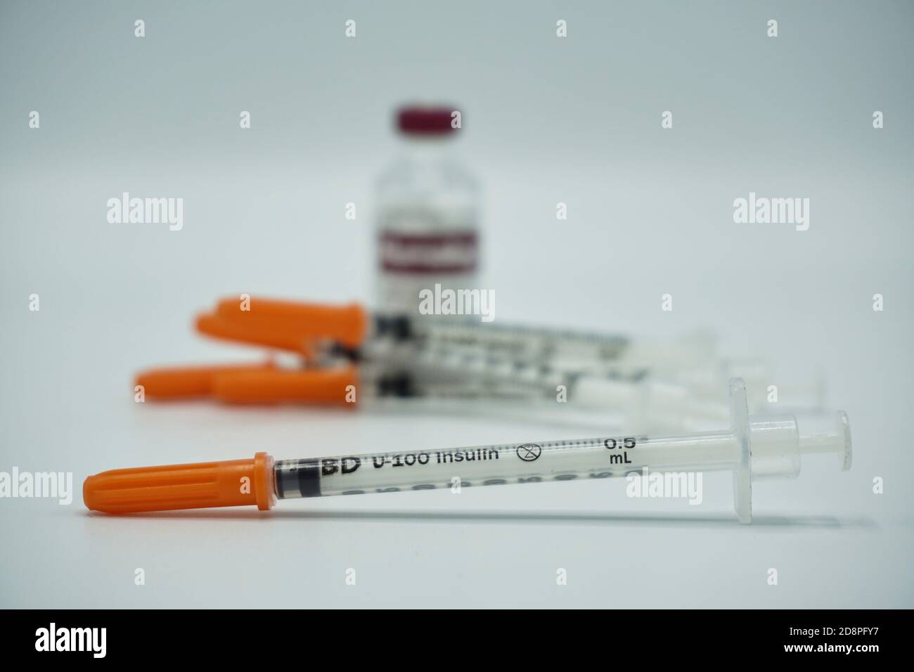 insulin bottle and disposable syringes for injections to treat diabetes ...