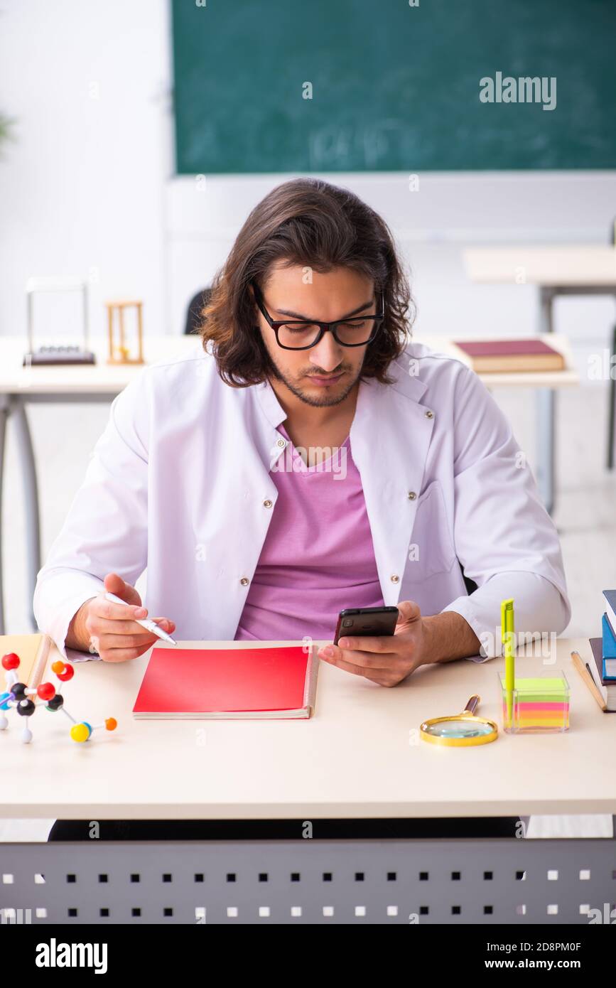 Young physicist in the classroom Stock Photo - Alamy