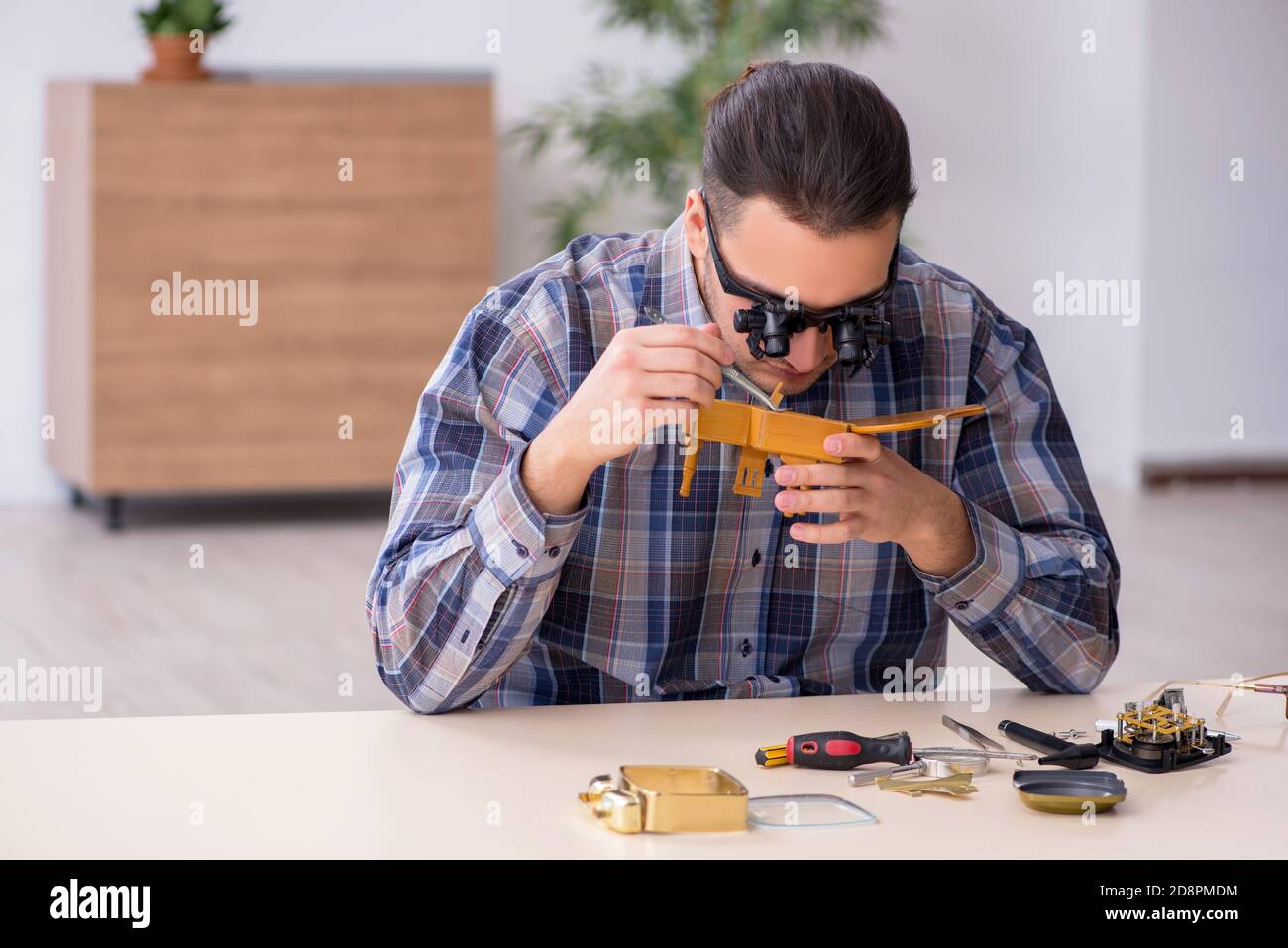 Handyman looking watch hi-res stock photography and images - Alamy