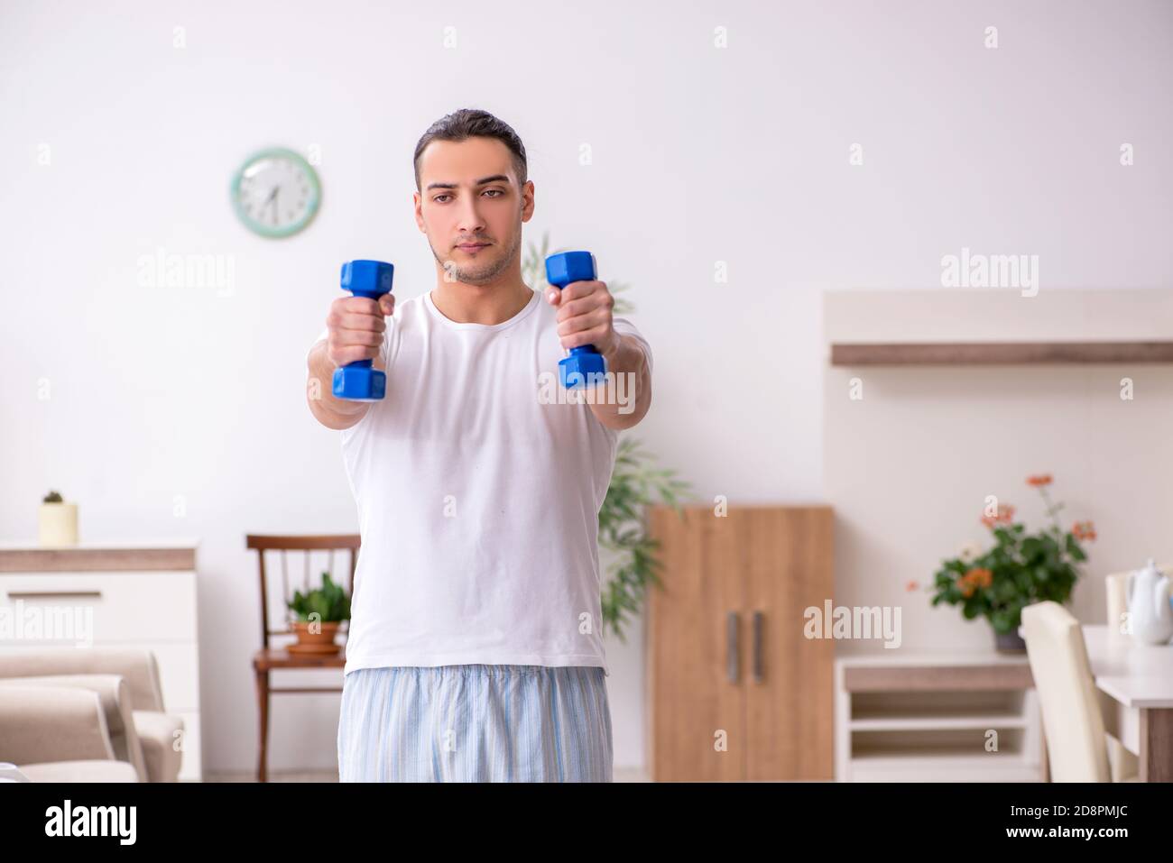 Man starting day with morning exercises Stock Photo - Alamy