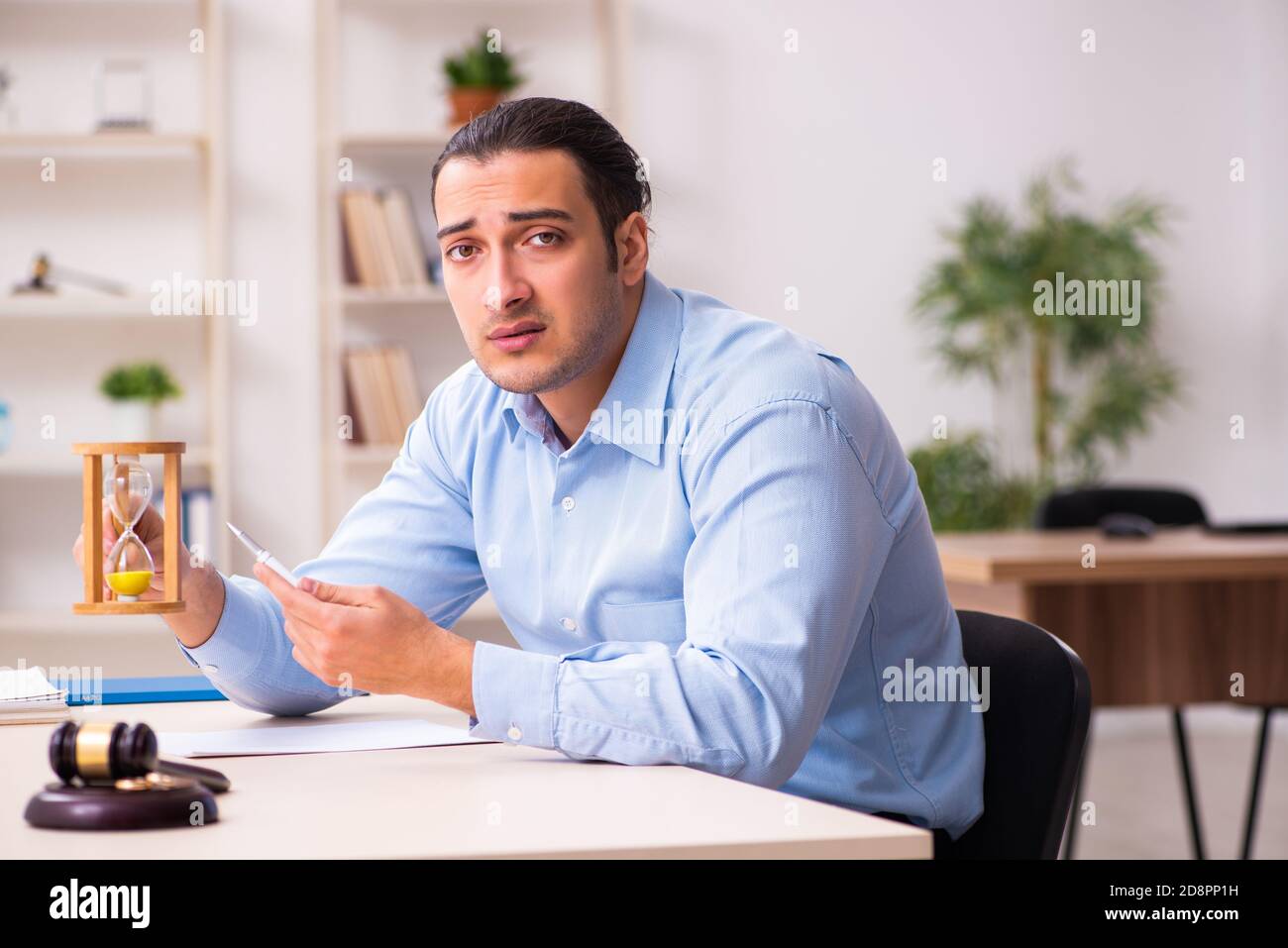 Young man in the courthouse in divorcing concept Stock Photo - Alamy