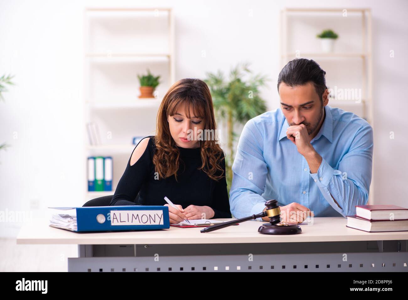 Couple divorcing in alimony concept Stock Photo - Alamy