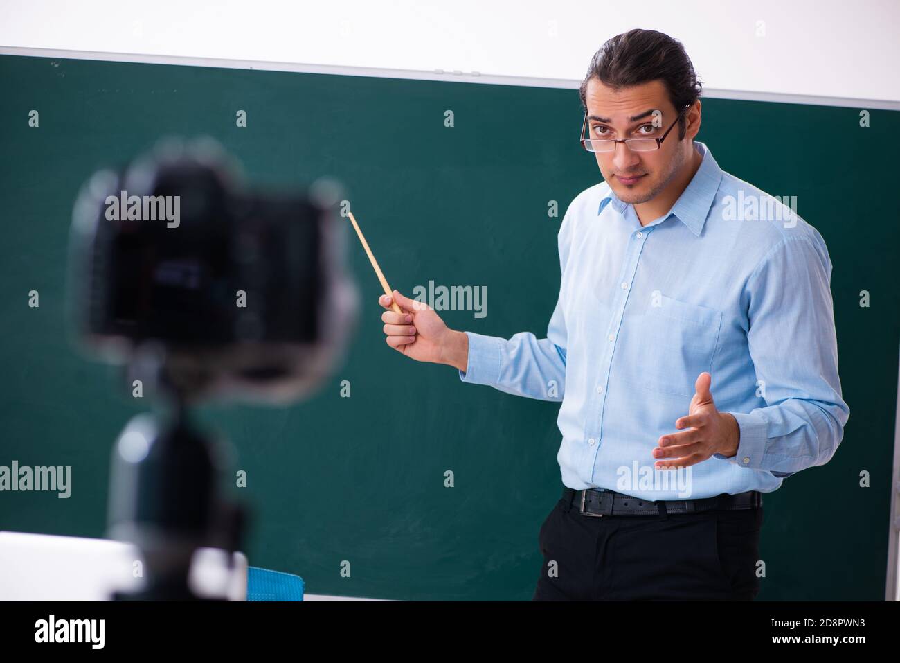 Camera filming lesson male teacher hi-res stock photography and images ...