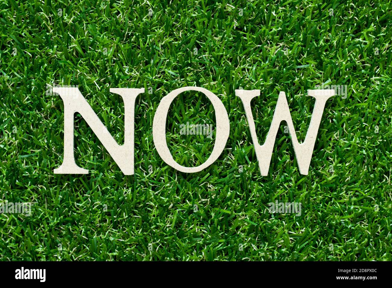 Wood alphabet letter in word now on green grass background Stock Photo ...