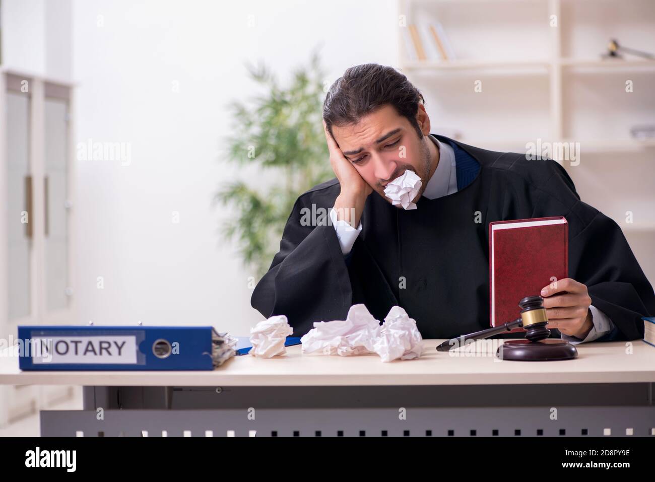 Young judge working in courthouse Stock Photo - Alamy