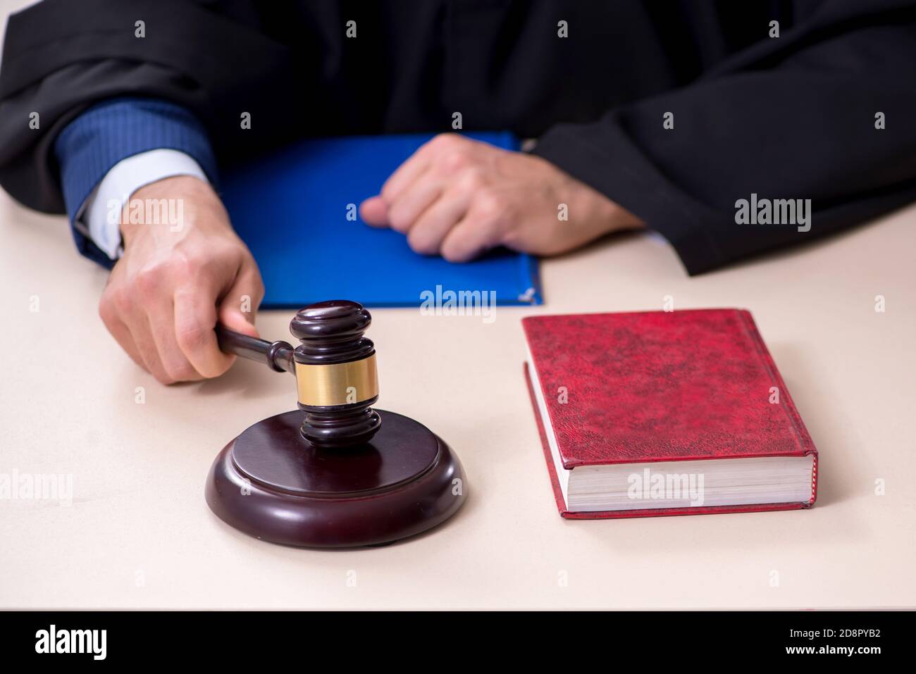 Young judge working in courthouse Stock Photo - Alamy