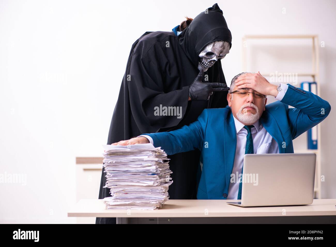Old businessman employee making deal with the devil Stock Photo - Alamy