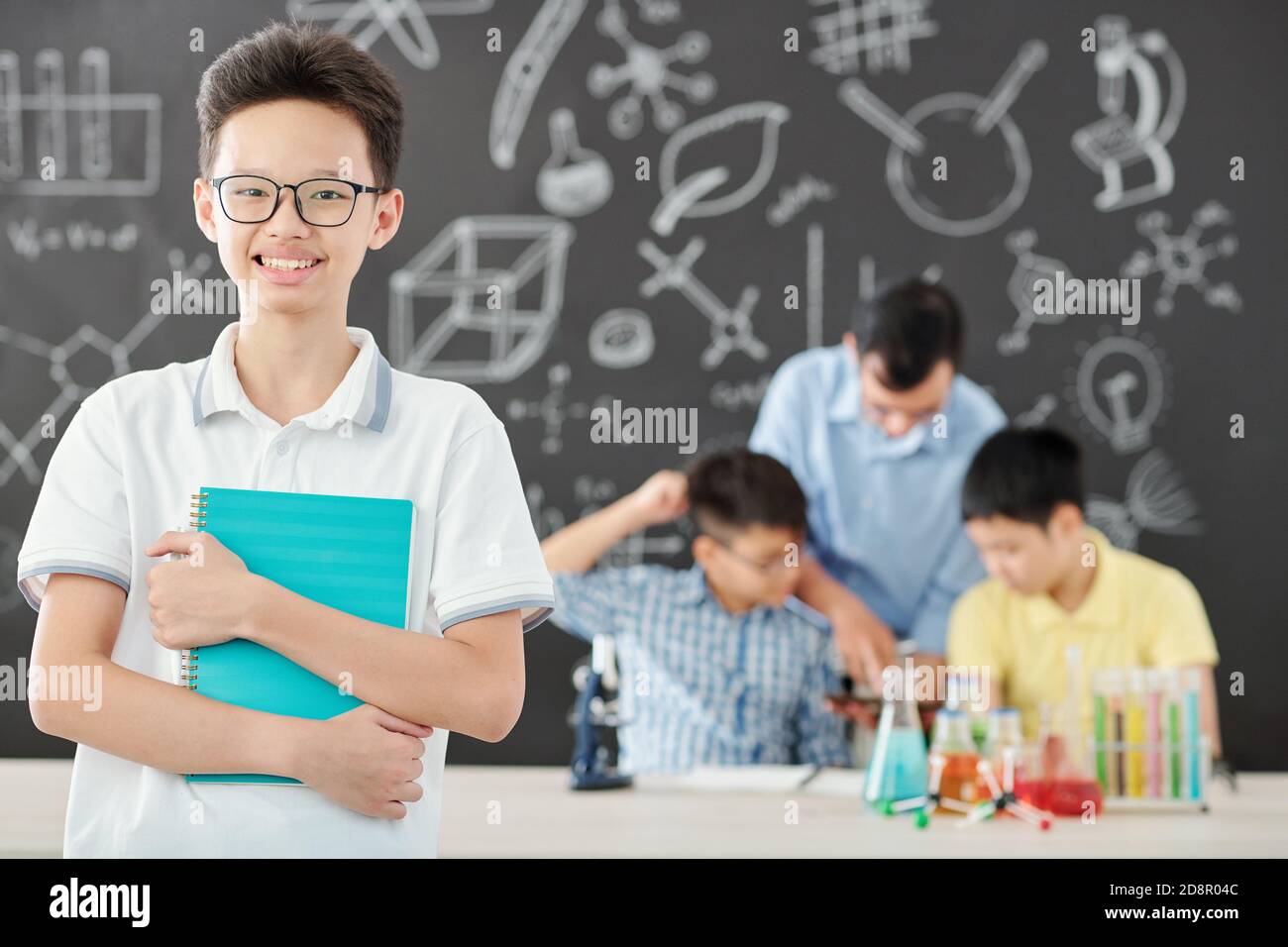 Asian teacher glasses classroom hi-res stock photography and images - Alamy