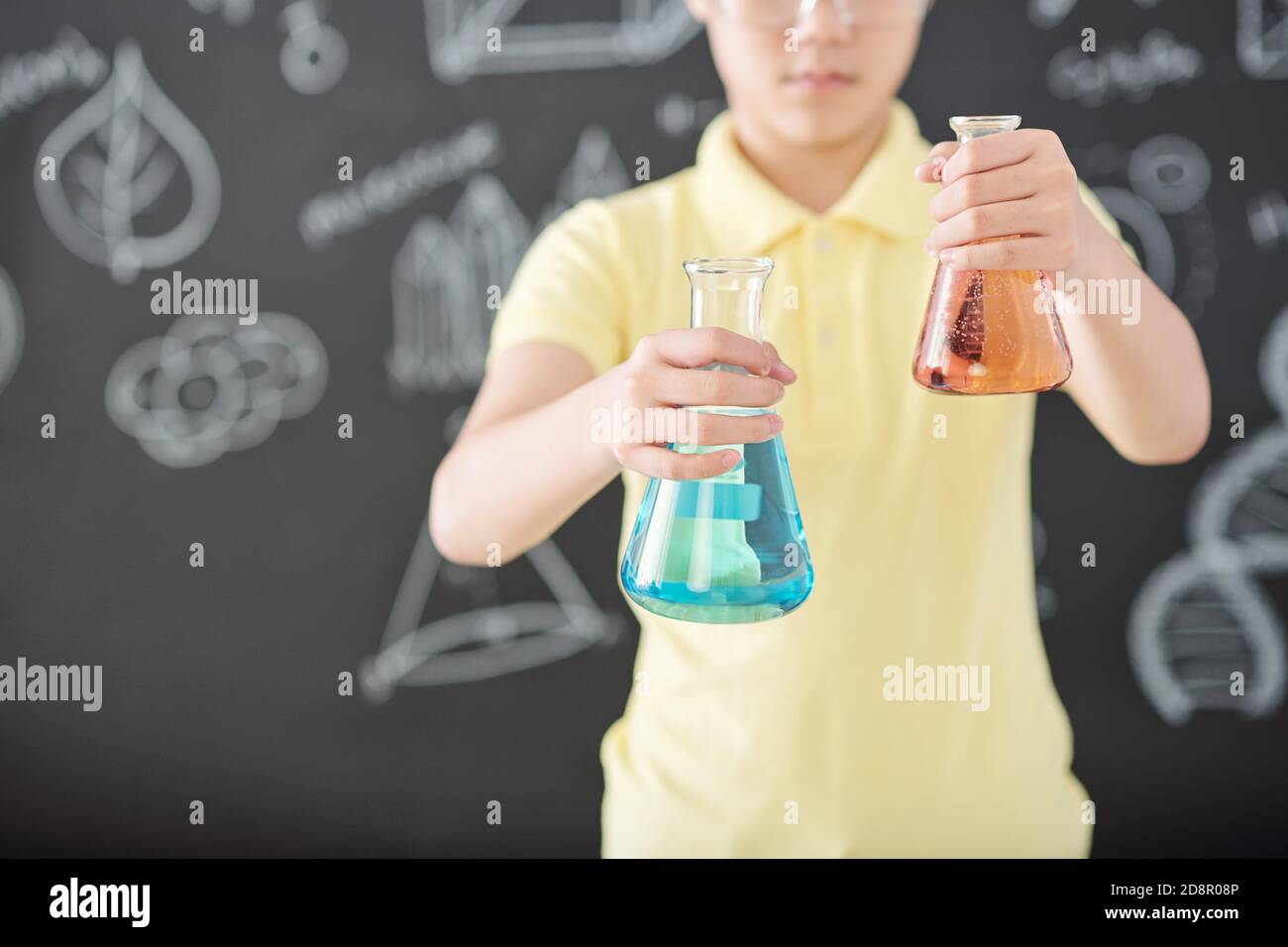 School kid with chemical liquids Stock Photo - Alamy