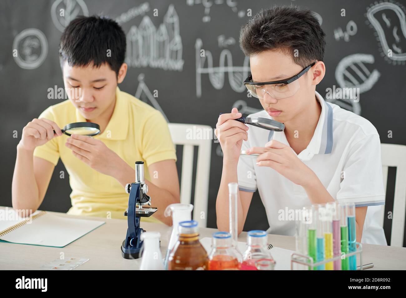 Curious kids in science class Stock Photo - Alamy
