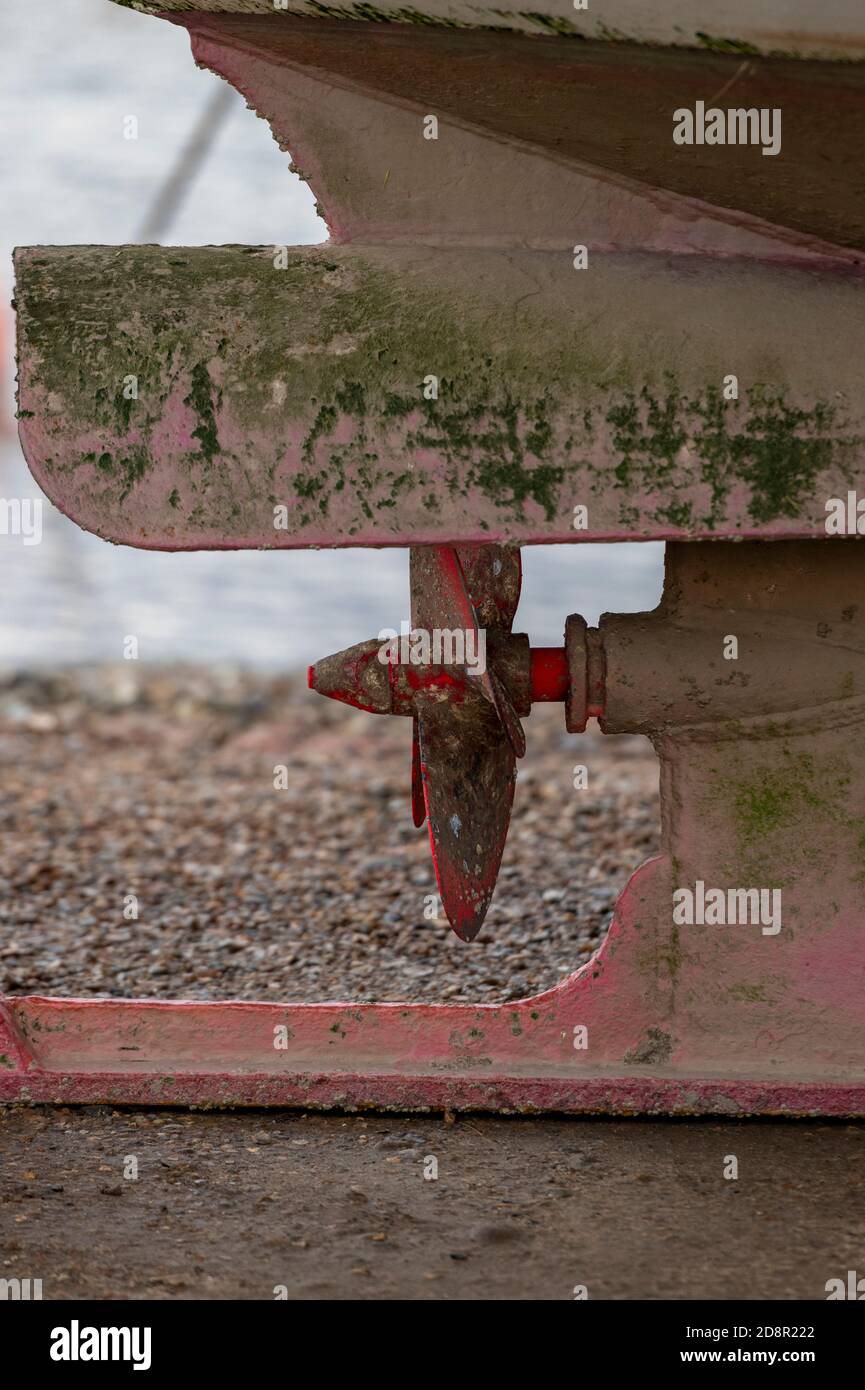 a ships rudder, keel, propellor and steering gear on an old boat ashore ...