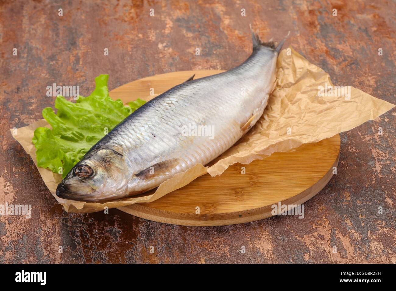 Salted herring fish ready for eat Stock Photo - Alamy
