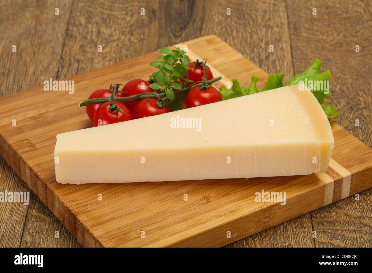 Italian traditional parmesan cheese triangle served salad Stock Photo ...