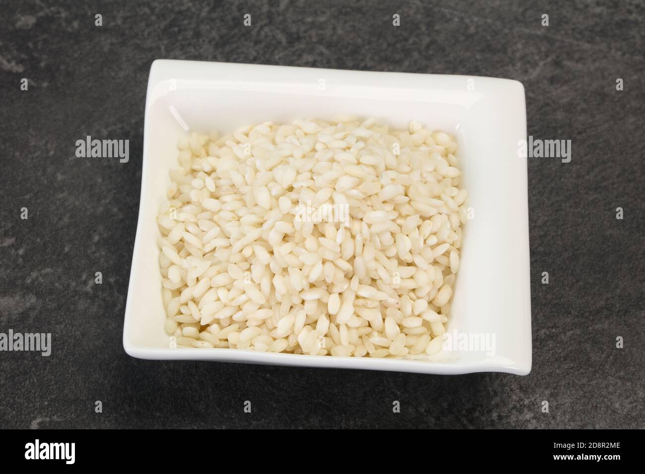 Raw Arborio rice for Italian risotto Stock Photo - Alamy