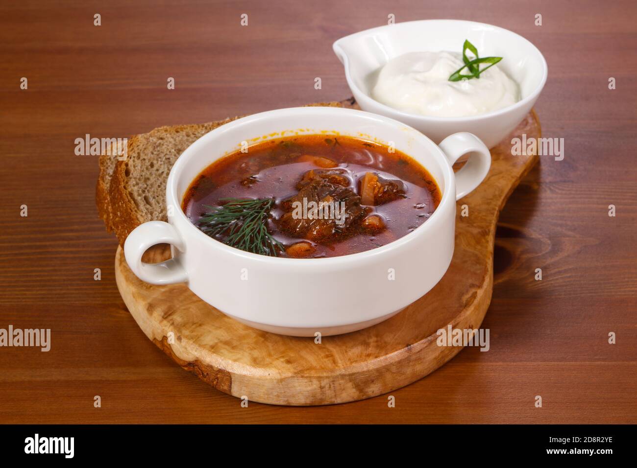 Traditional Russian borsch with beef and sour cream Stock Photo - Alamy