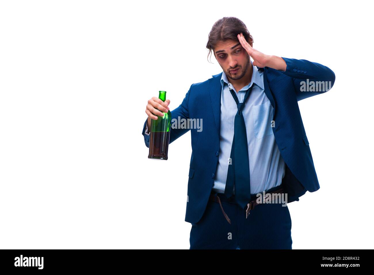 Young employee alcoholic isolated on white Stock Photo - Alamy