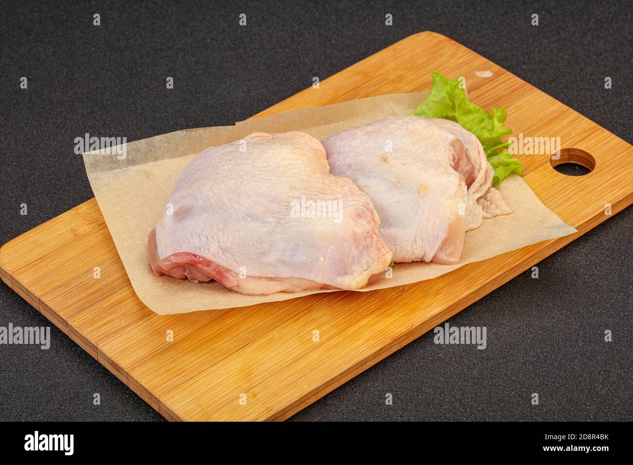 Raw chicken hip ready for cooking Stock Photo - Alamy