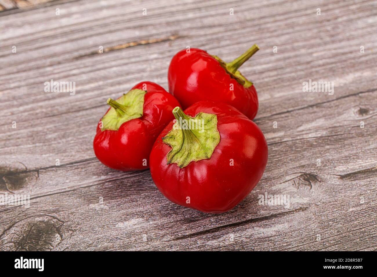Red hot and spicy cherry pepper Stock Photo - Alamy