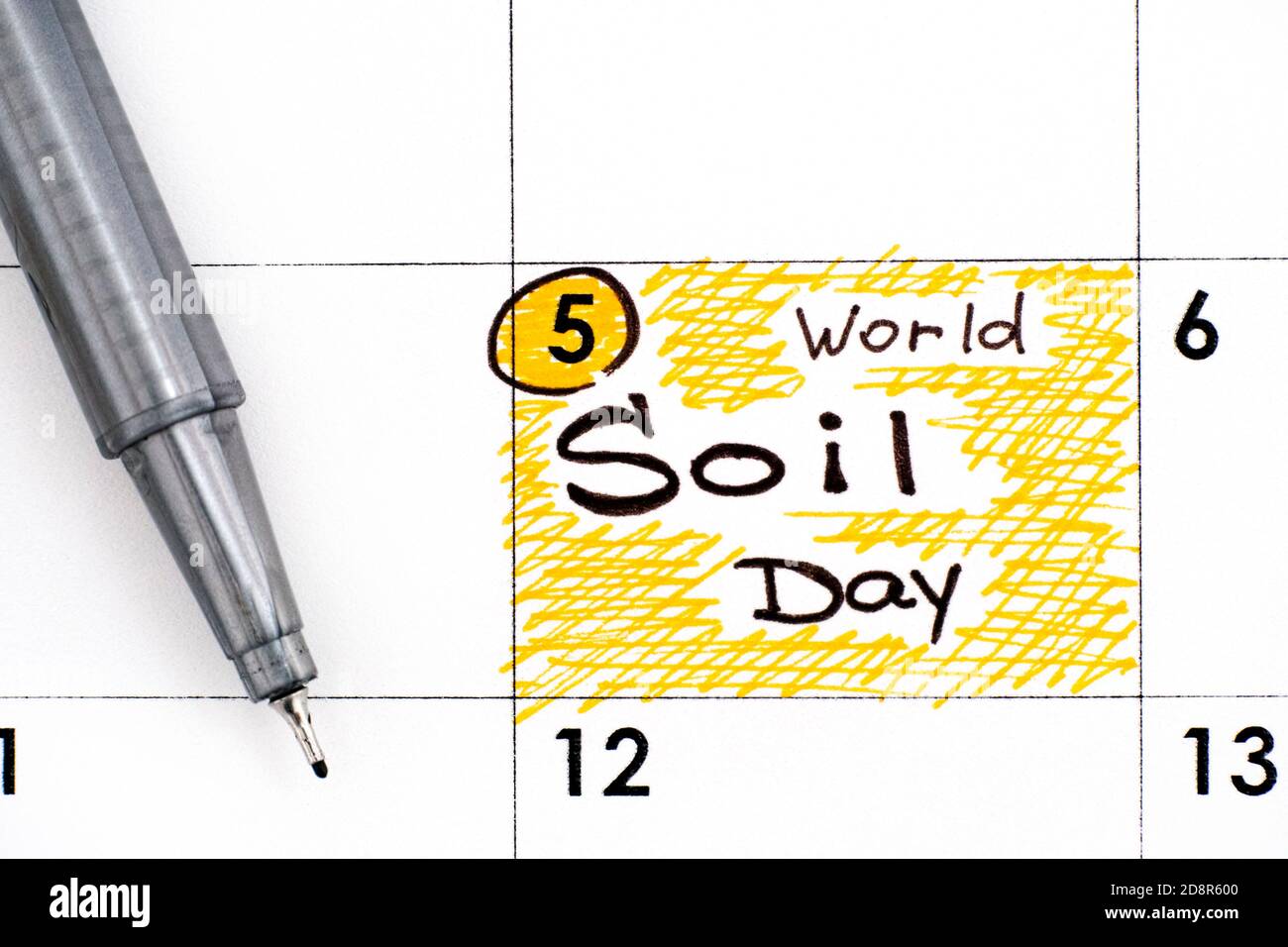Reminder World Soil Day in calendar with pen. December 05 Stock Photo ...
