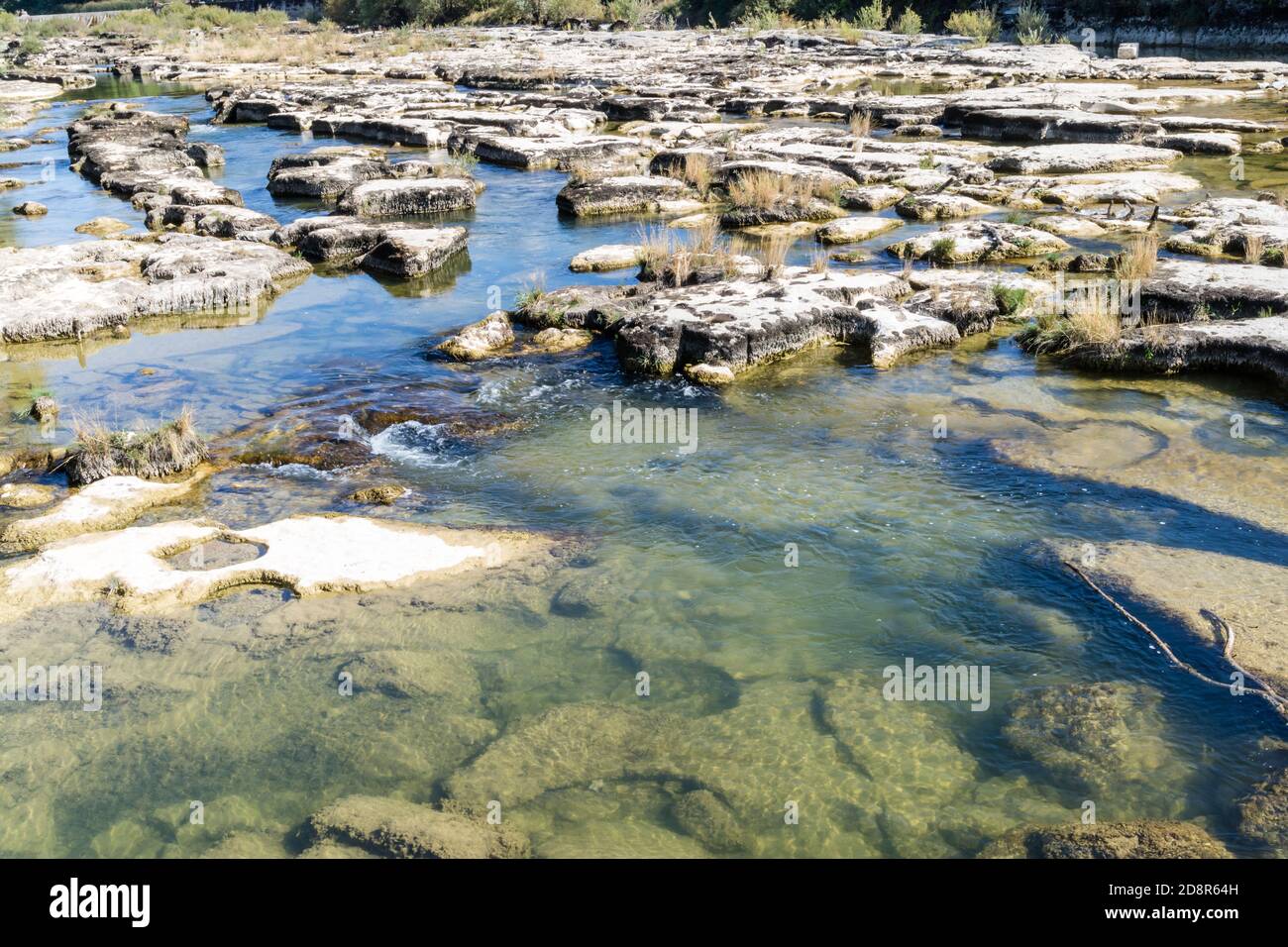 Impressive rock formation in the Ain river at Pont de Poitte village ...