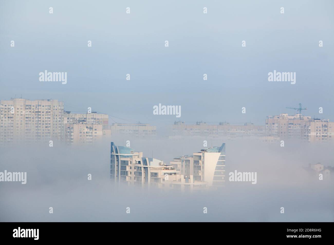 Highrise residential building in the fog Stock Photo - Alamy