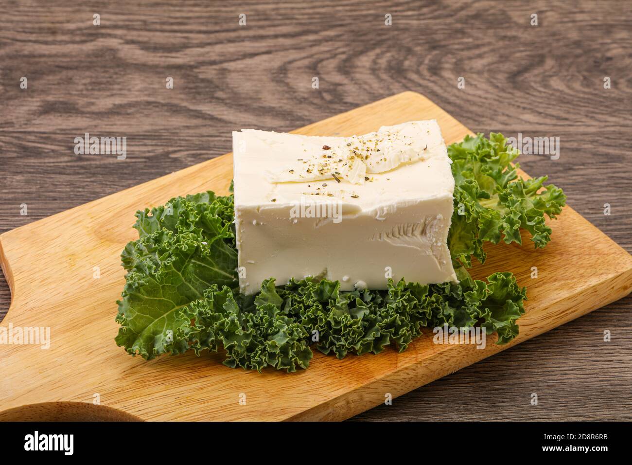Traditional tasty Greek Feta soft cheese brick Stock Photo - Alamy