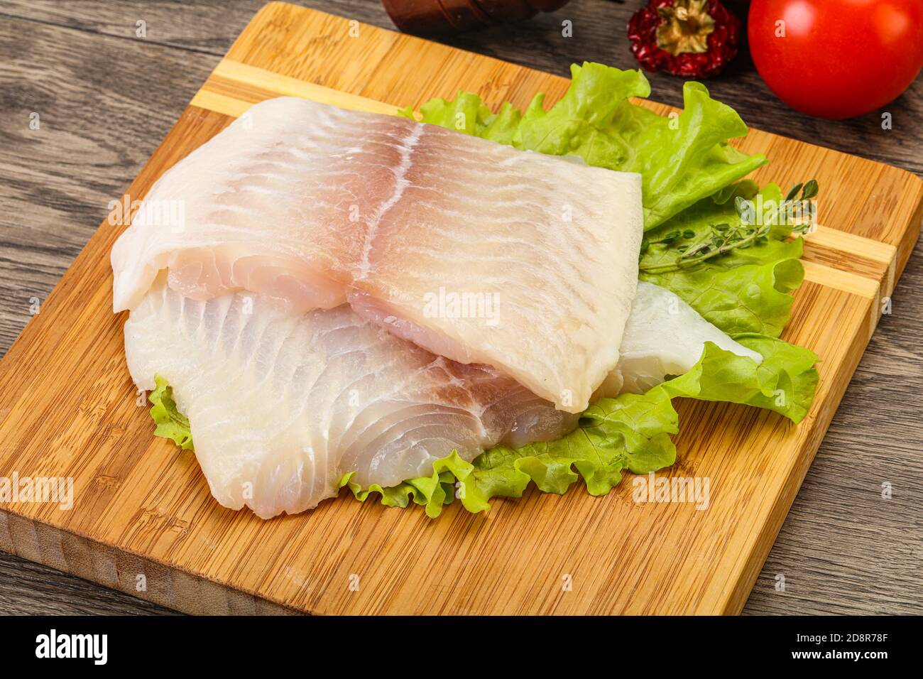 Raw pangasius fillet fish for cooking Stock Photo - Alamy