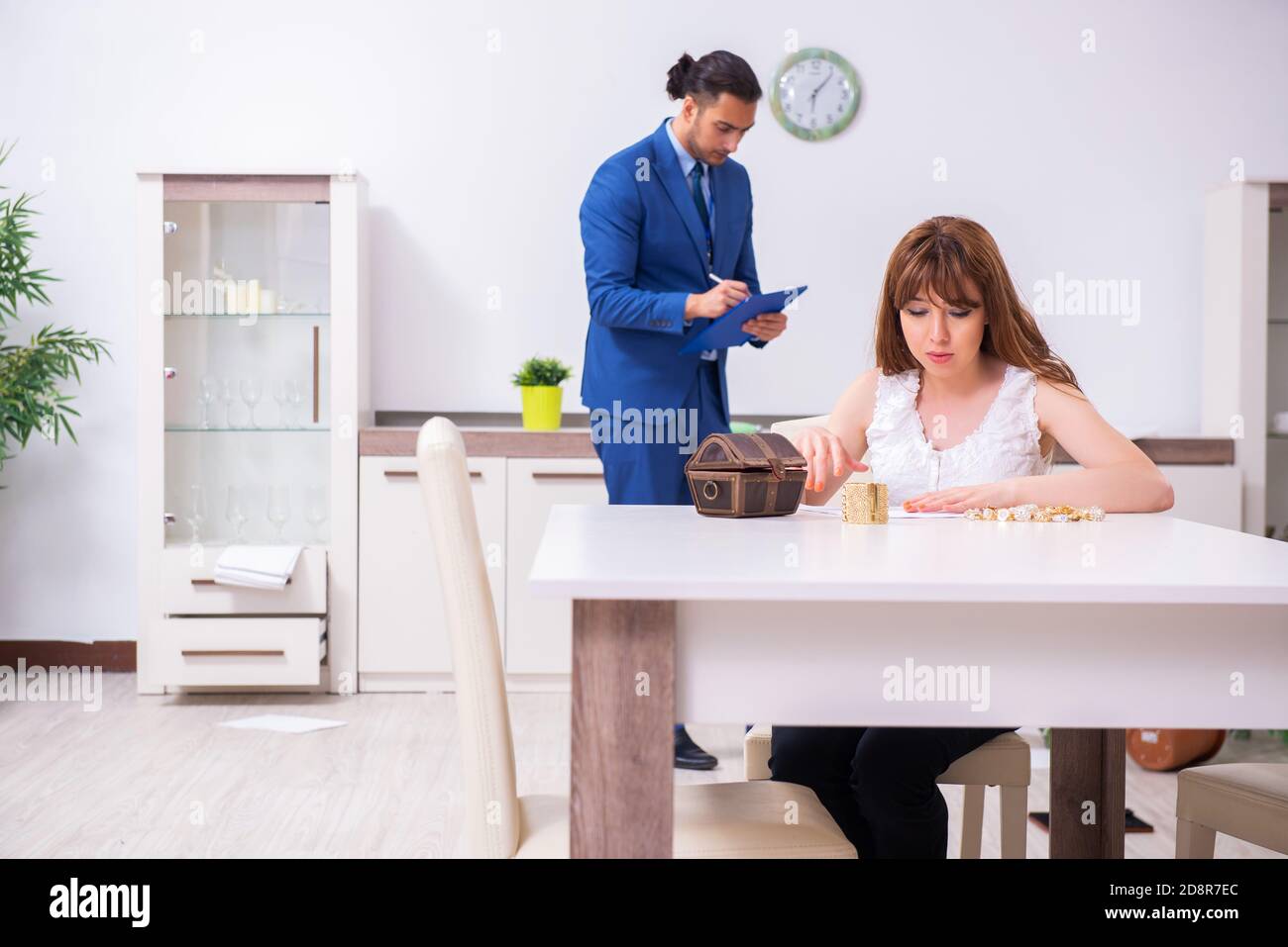 Female owner and police officer in housebreaking concept Stock Photo ...