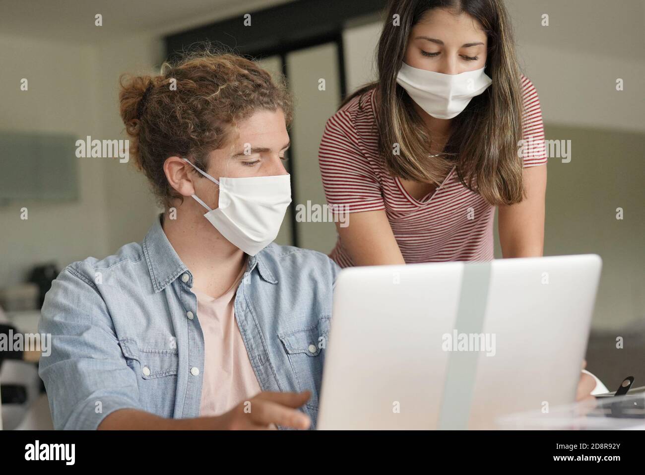 group of students working wearing masks Stock Photo - Alamy