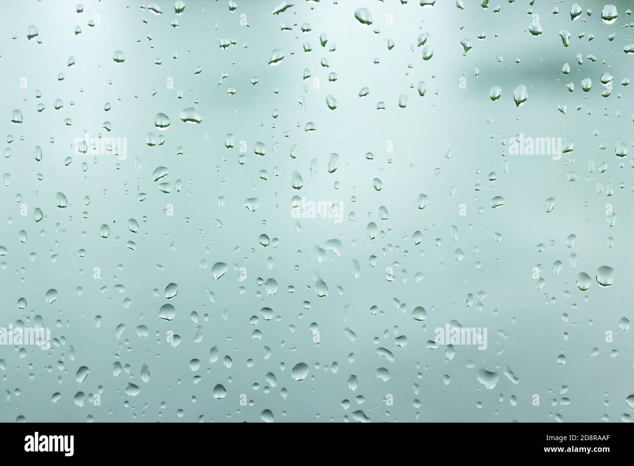 Water drop on glass hi-res stock photography and images - Alamy